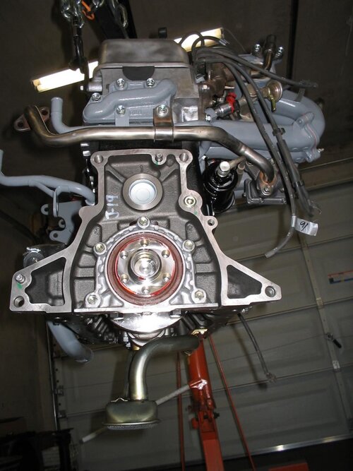 How do I replace the coolant lines under the intake manifold on a 22re ...